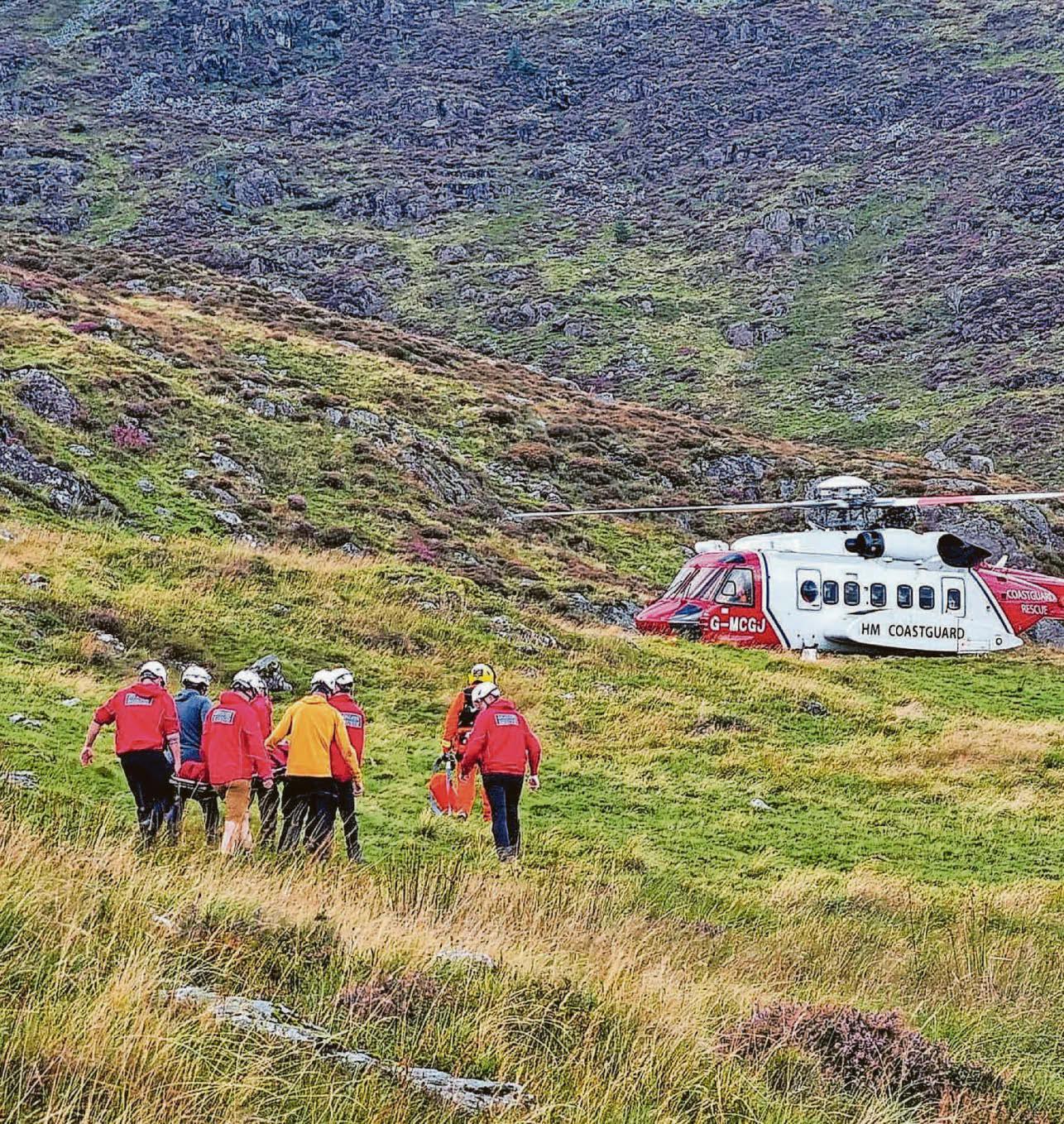 Airlift for walker with broken spine in 20ft plunge as wife waits ...