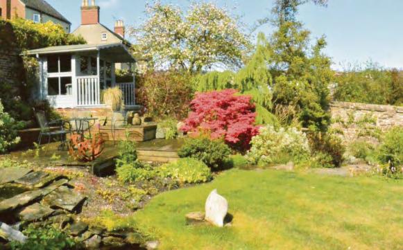 Take a peek at quirky town's gardens and enjoy station floral displays ...