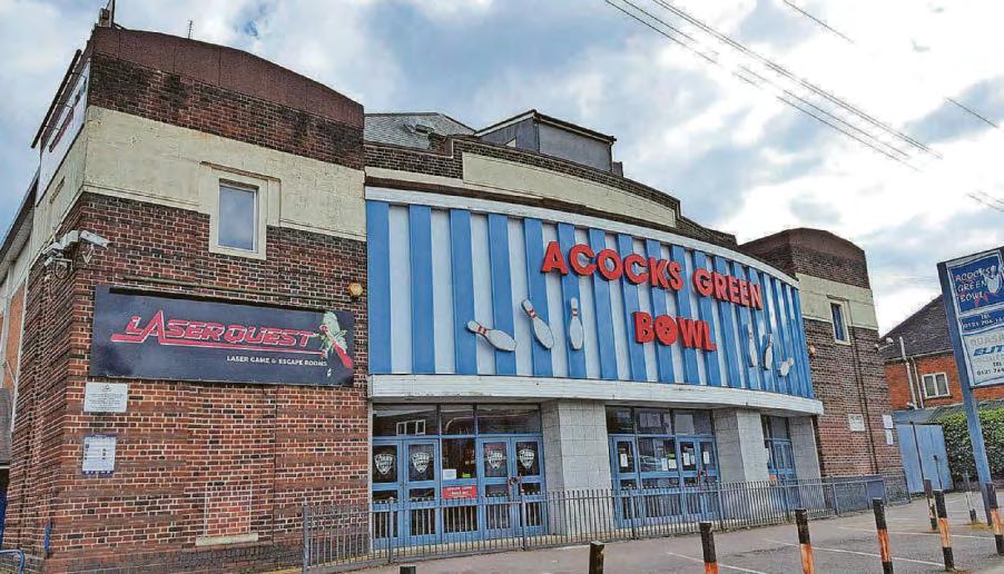 Landmark bowling alley gets new owners after founders retire ...