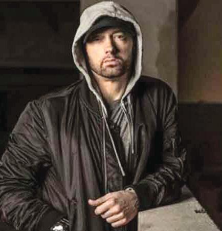 Ex-Eminem employee charged with leaking rapper's unreleased music ...